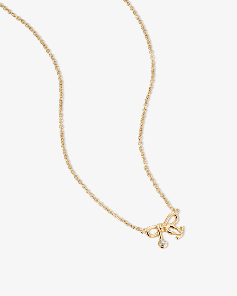 Tiny Stethoscope Bow Necklace – V Coterie